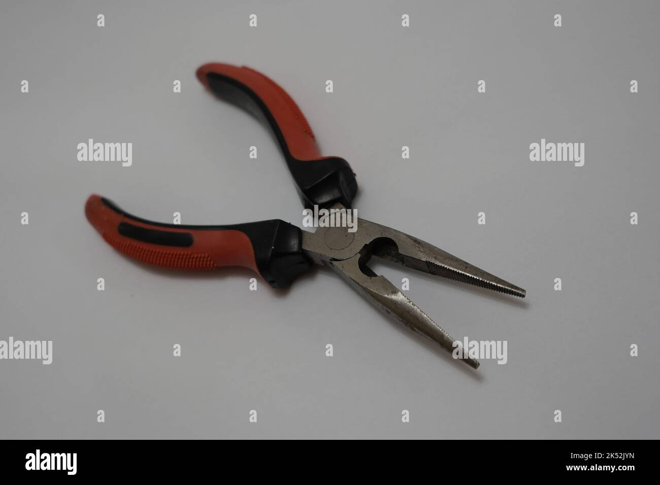 Pliers on a light backgroundpliers on a light background Stock Photo ...