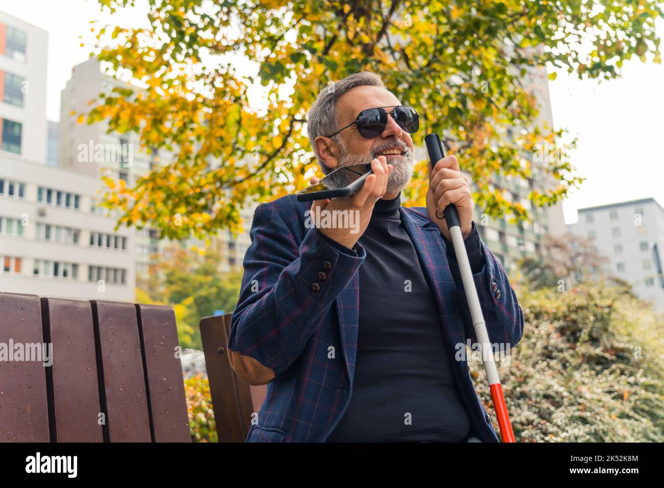 Sight challenged bearded caucasian man in formal clothing smiling ...