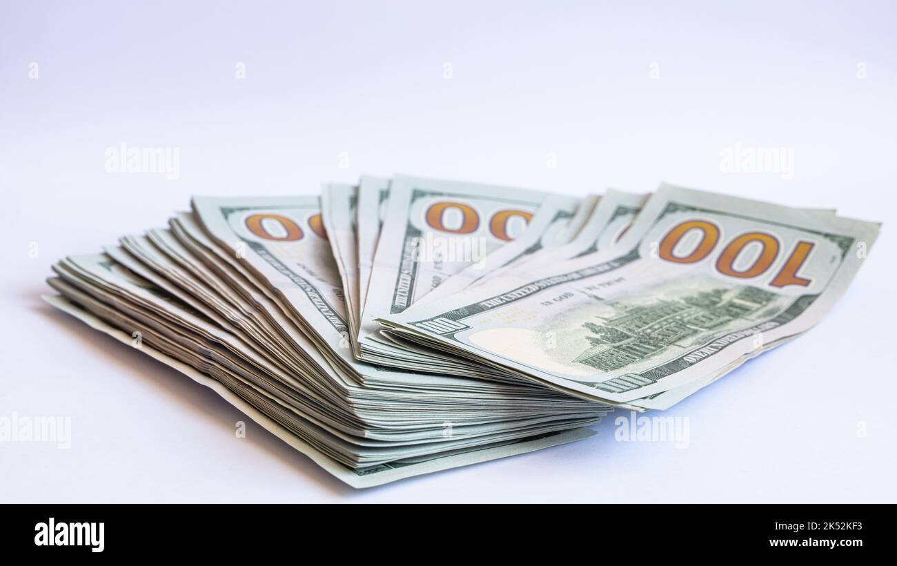Pile of 100 dollar banknotes on white background for design purpose ...