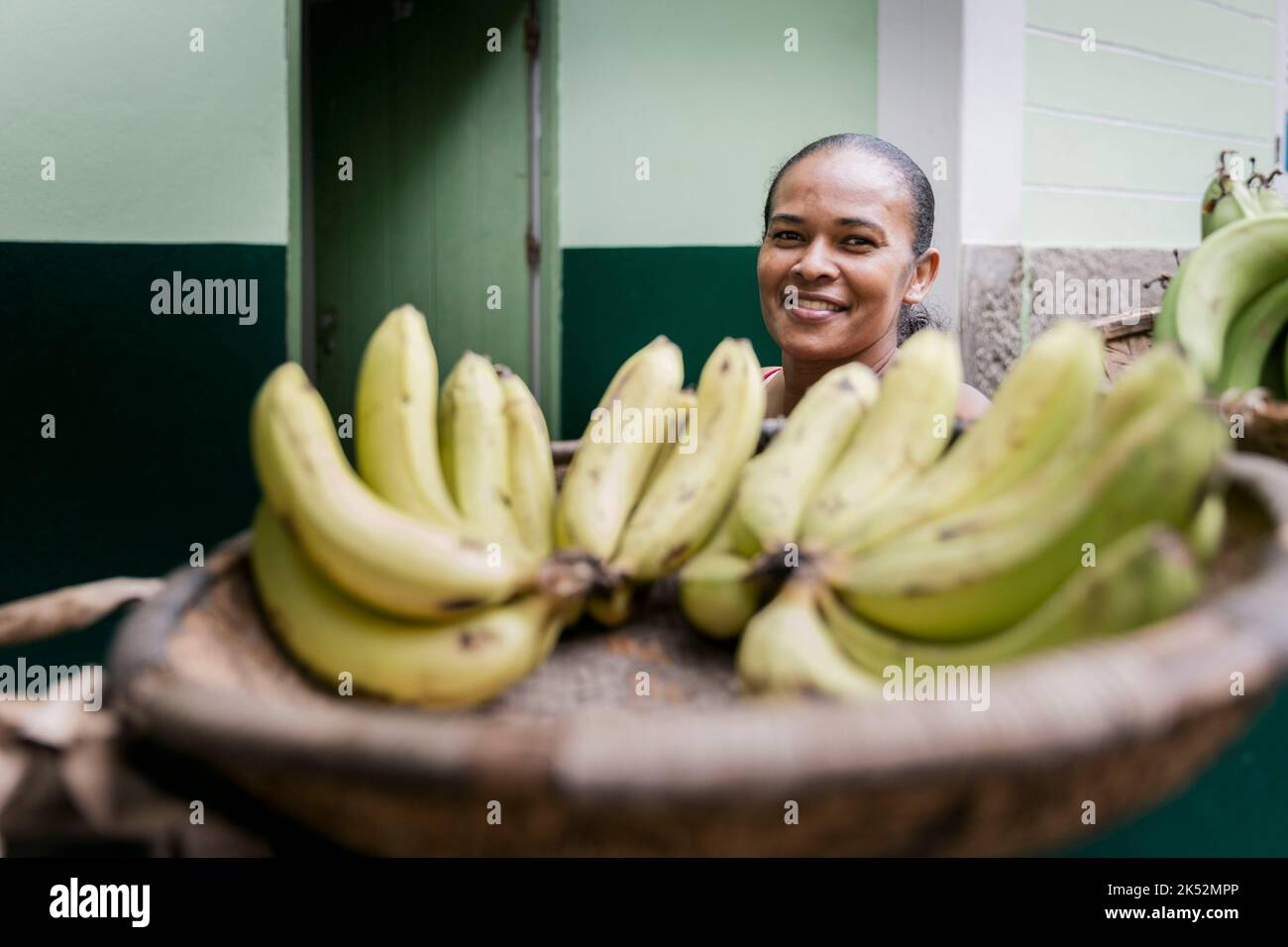 Cape Verde, Santo Antao island, woman bandaging local fruits Stock ...
