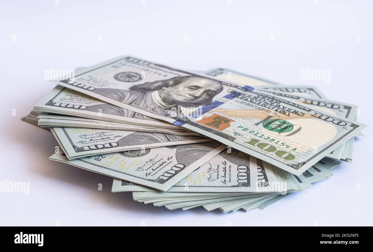 Pile of 100 dollar banknotes on white background for design purpose ...