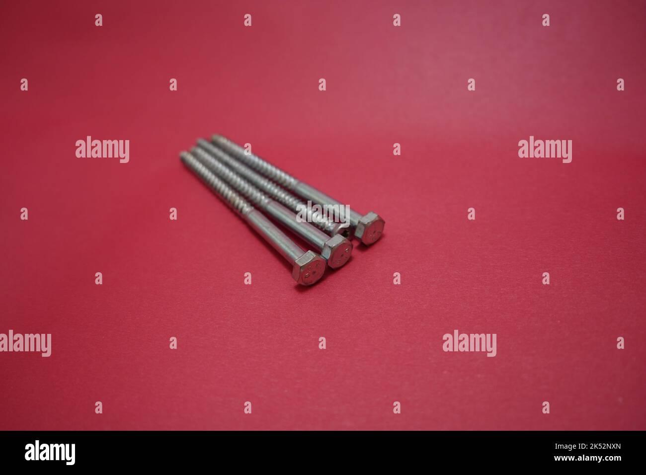 Screw background, Screw is a material that holds three objects together ...