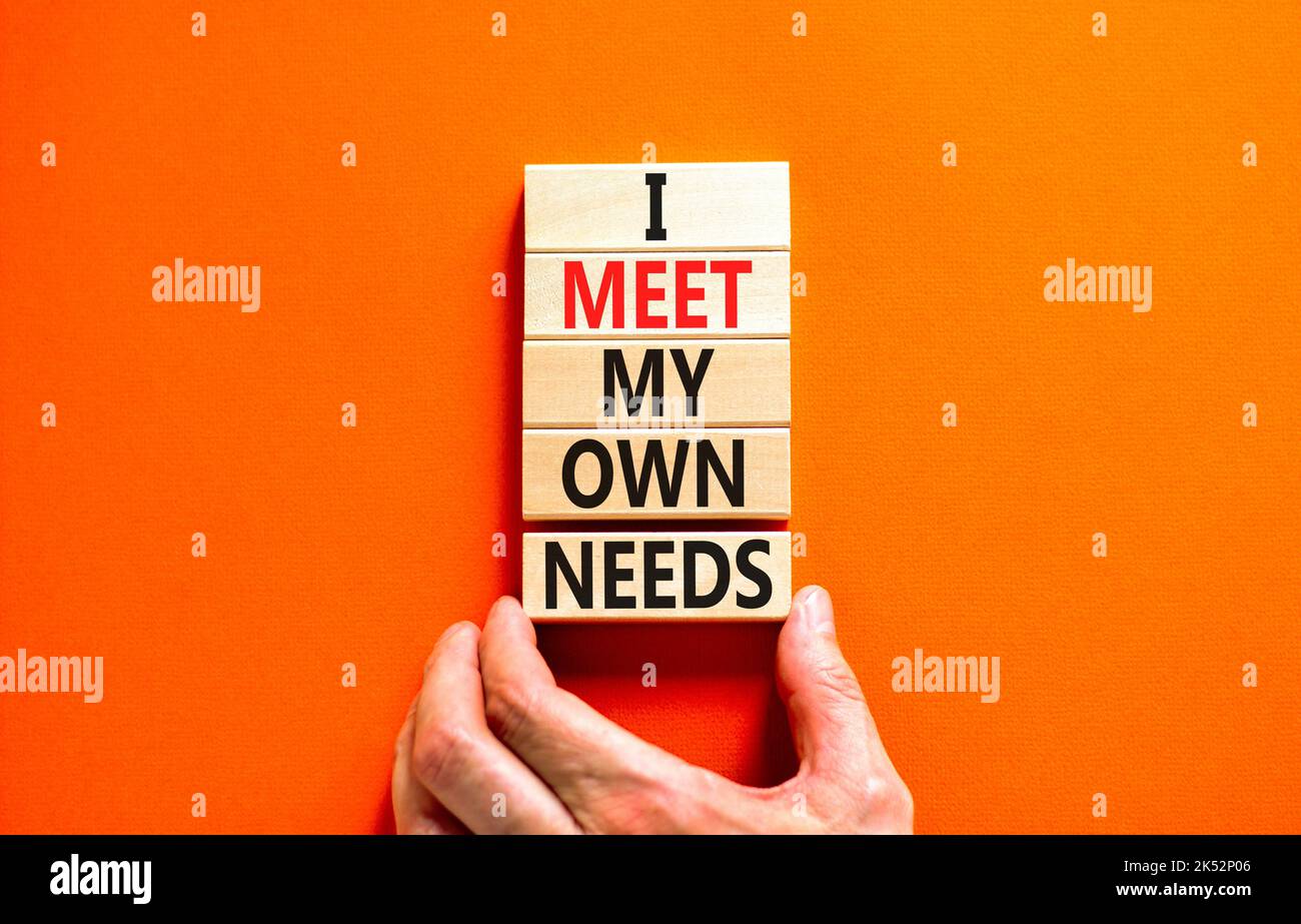 I meet my own needs symbol. Concept words I meet my own needs on wooden ...