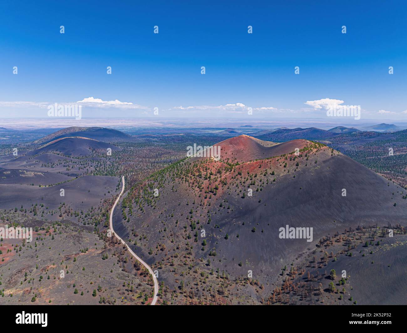 The sunset crater cinder cone volcano in Sunset Crater National ...