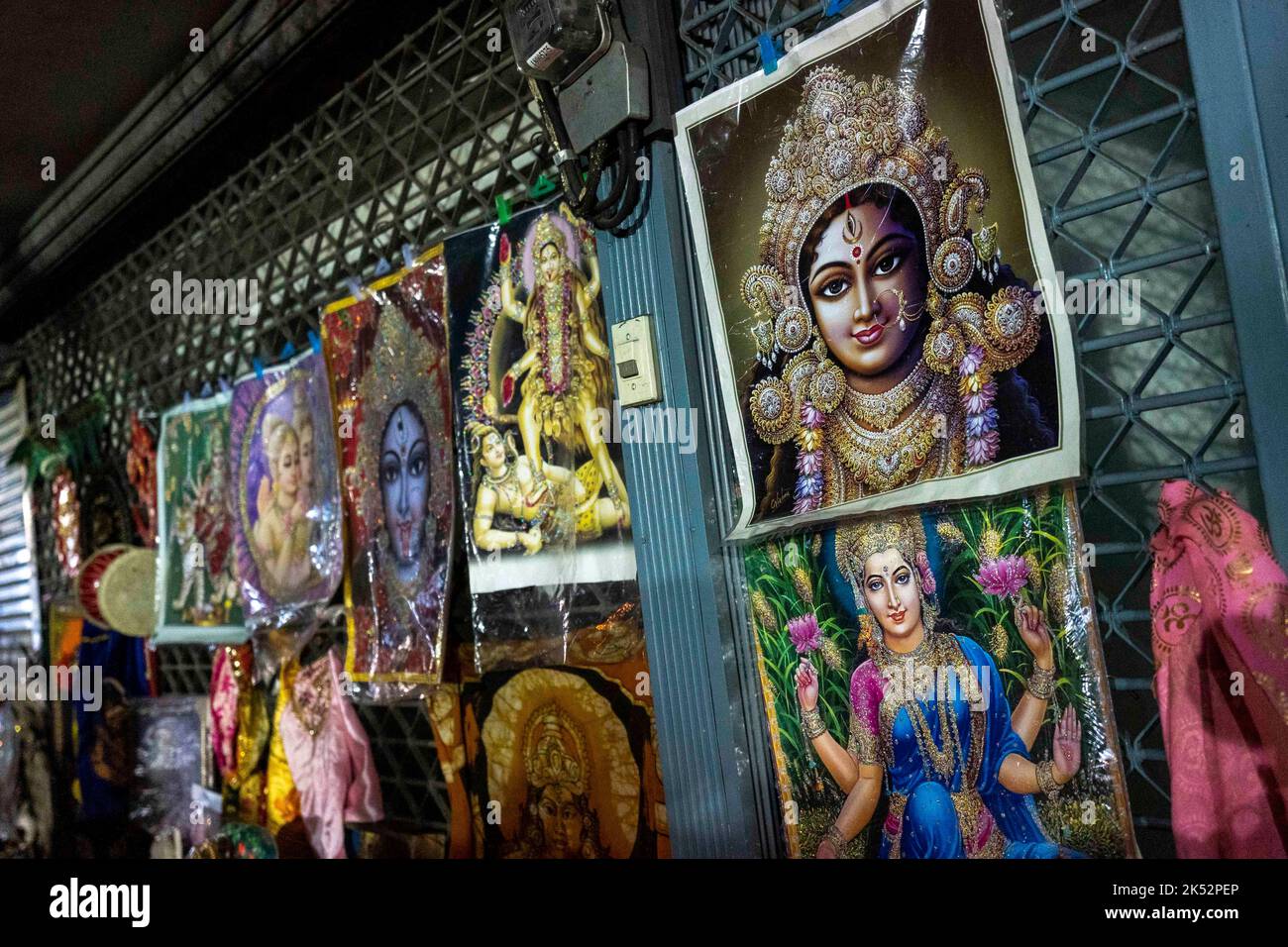 October 5, 2022: Posters of Hindu gods and goddess hang from a wall for ...