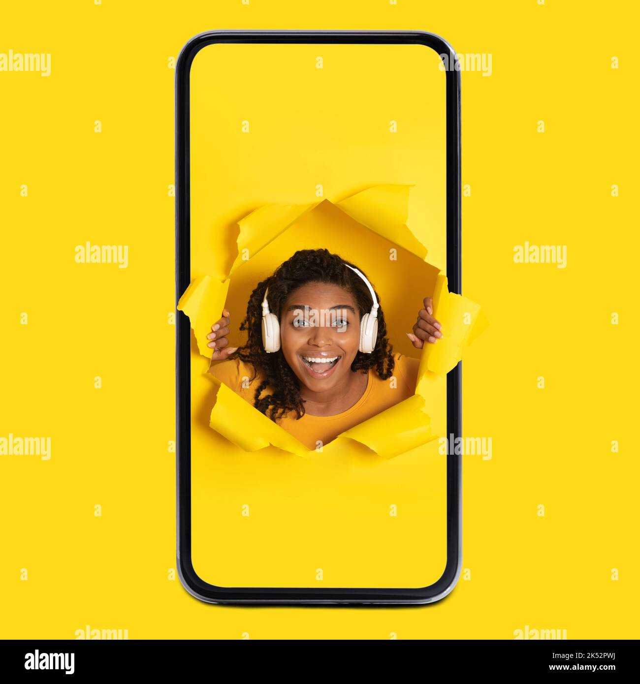 Black Woman In Cellphone Listening Music Wearing Headphones, Yellow Background Stock Photo - Alamy