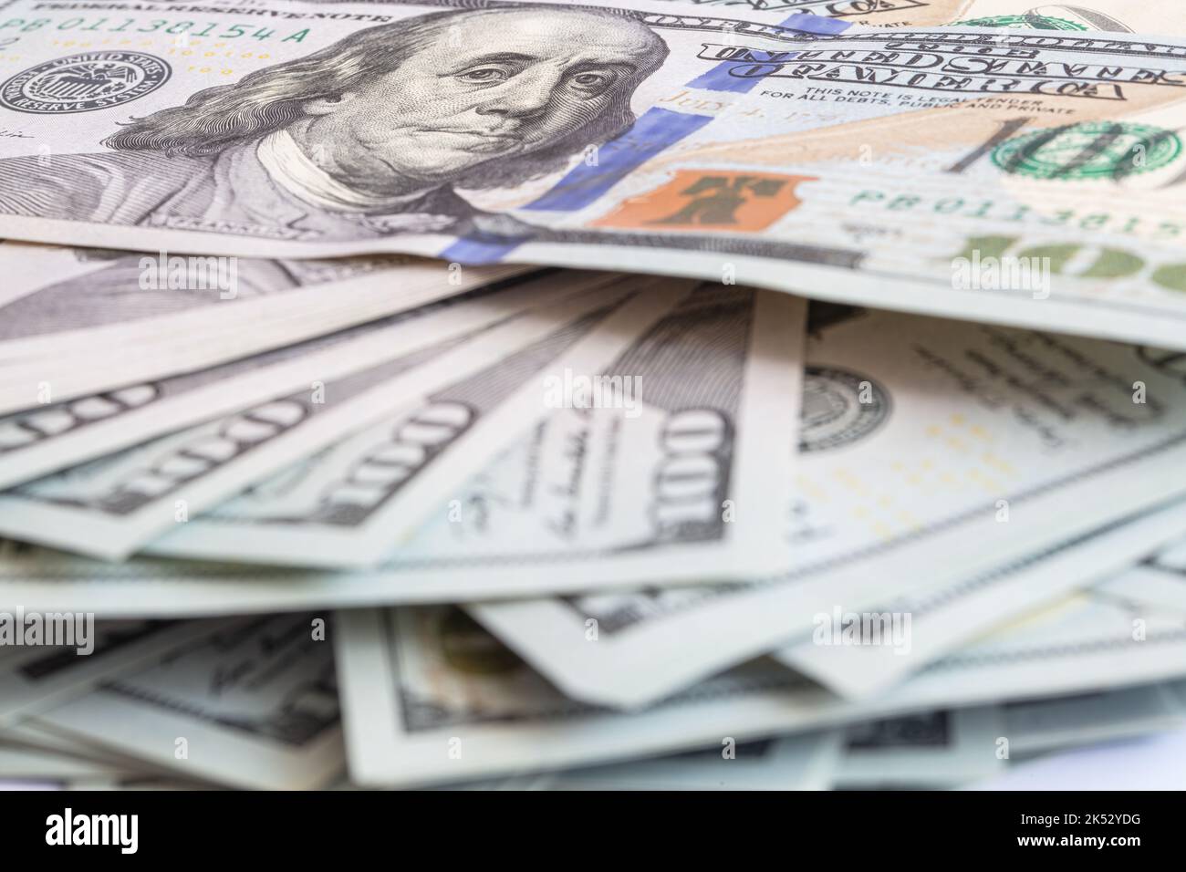 Pile of 100 dollar banknotes on white background for design purpose ...