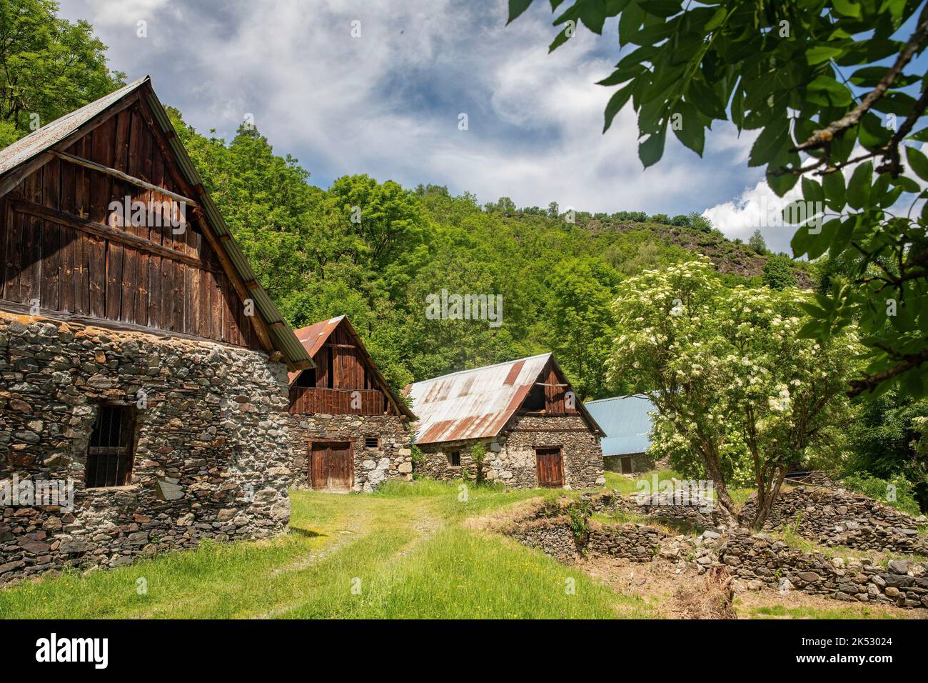 France, Haute-Garonne, Cazeaux-de-Larboust, barns of Labach Stock Photo ...
