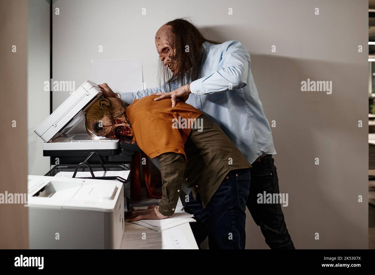 Office fun of zombie colleagues at work Stock Photo - Alamy