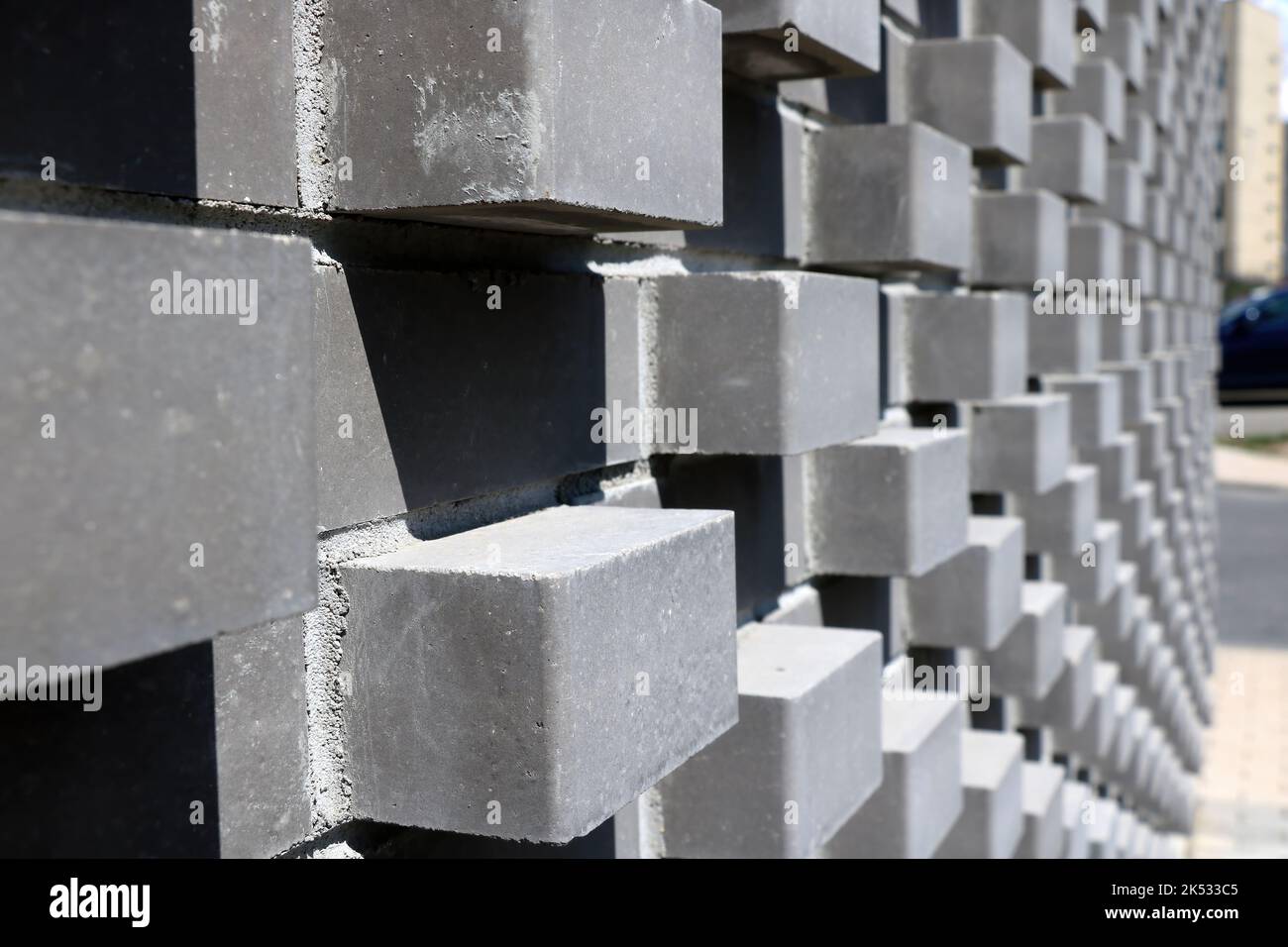 Symmetrically placed gray bricks outdoors with sunlight Stock Photo - Alamy Symmetrically placed gray bricks outdoors with sunlight Stock Photo - Alamy