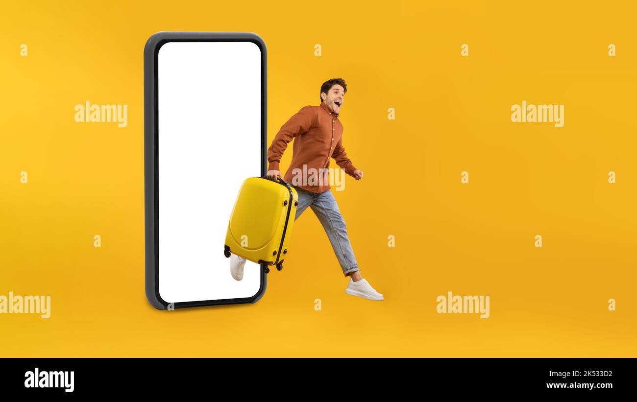 Tourist Man Jumping Out Of Huge Smartphone On Yellow Background Stock ...