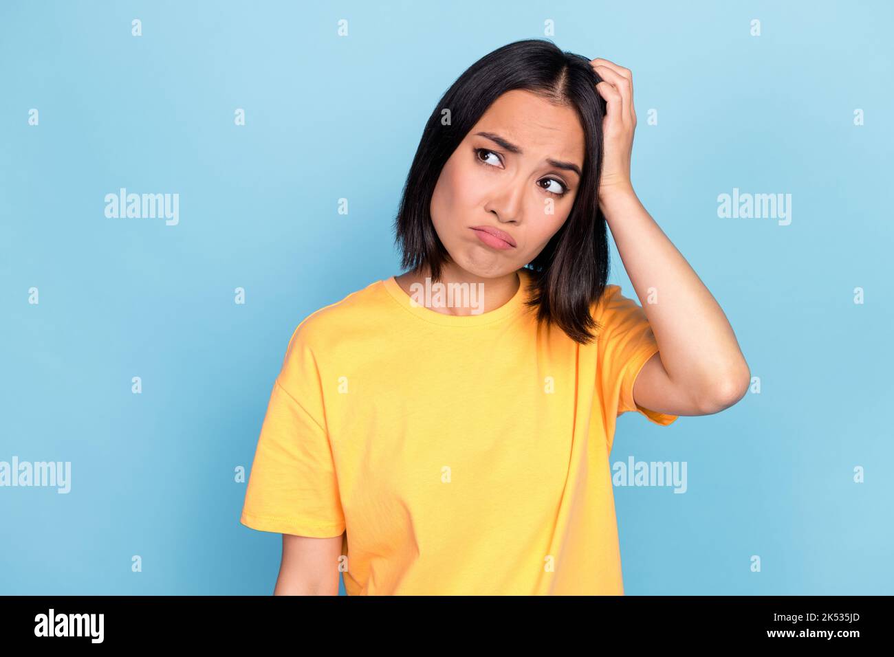 Photo of young adorable pretty nice woman scratch head pouted lips ...