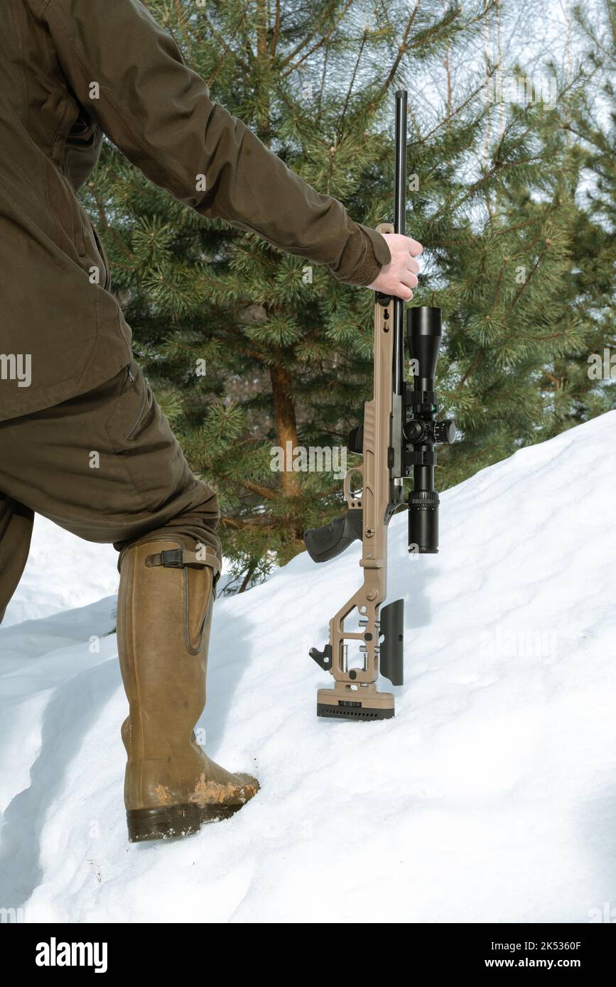 Mans hand holding gun hi-res stock photography and images - Alamy