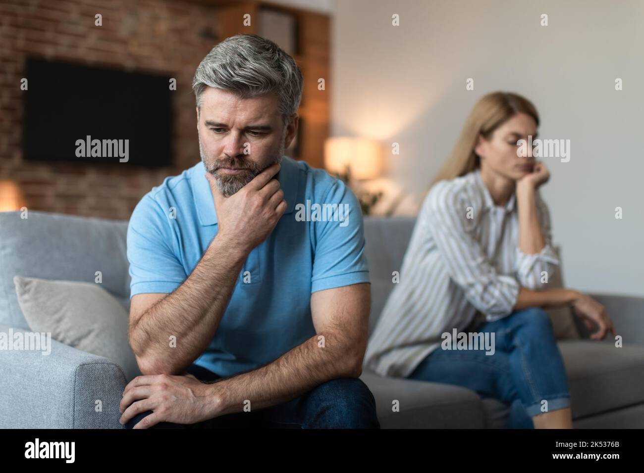 Couple despair sofa hi-res stock photography and images - Alamy