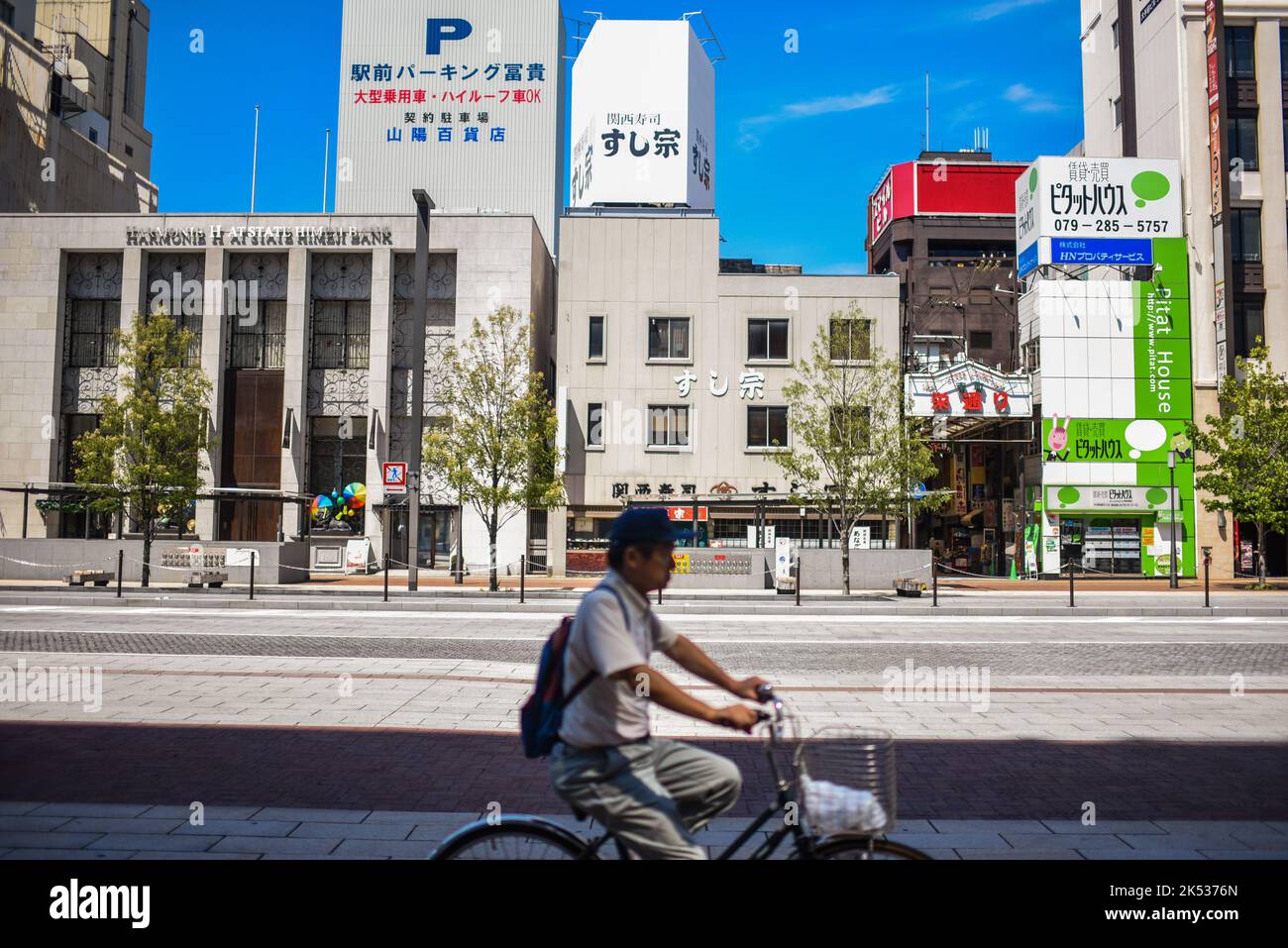 Bike rider in Himeji, Japan Stock Photo - Alamy