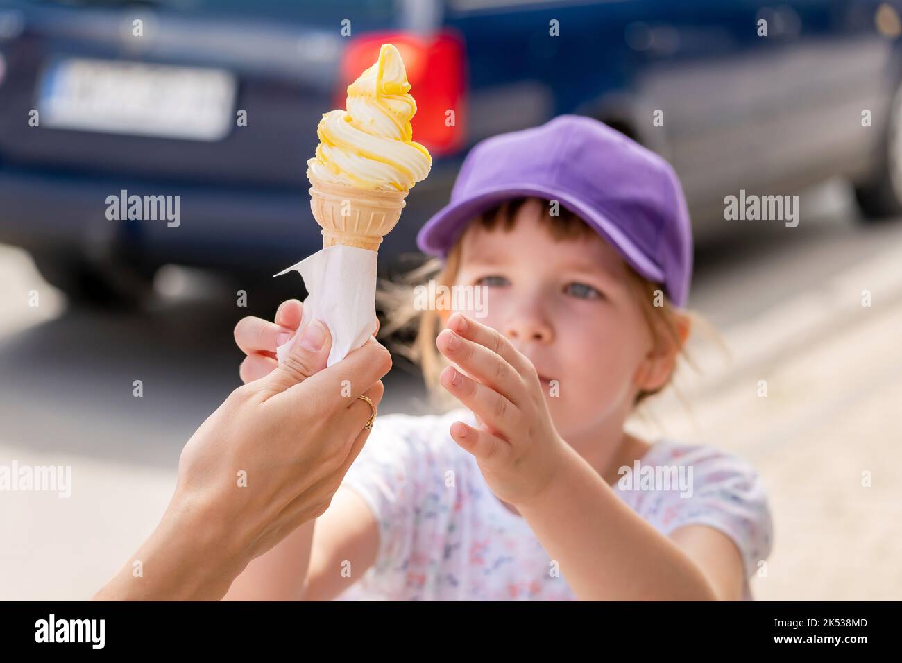 Woman giving candy to children hi-res stock photography and images - Alamy