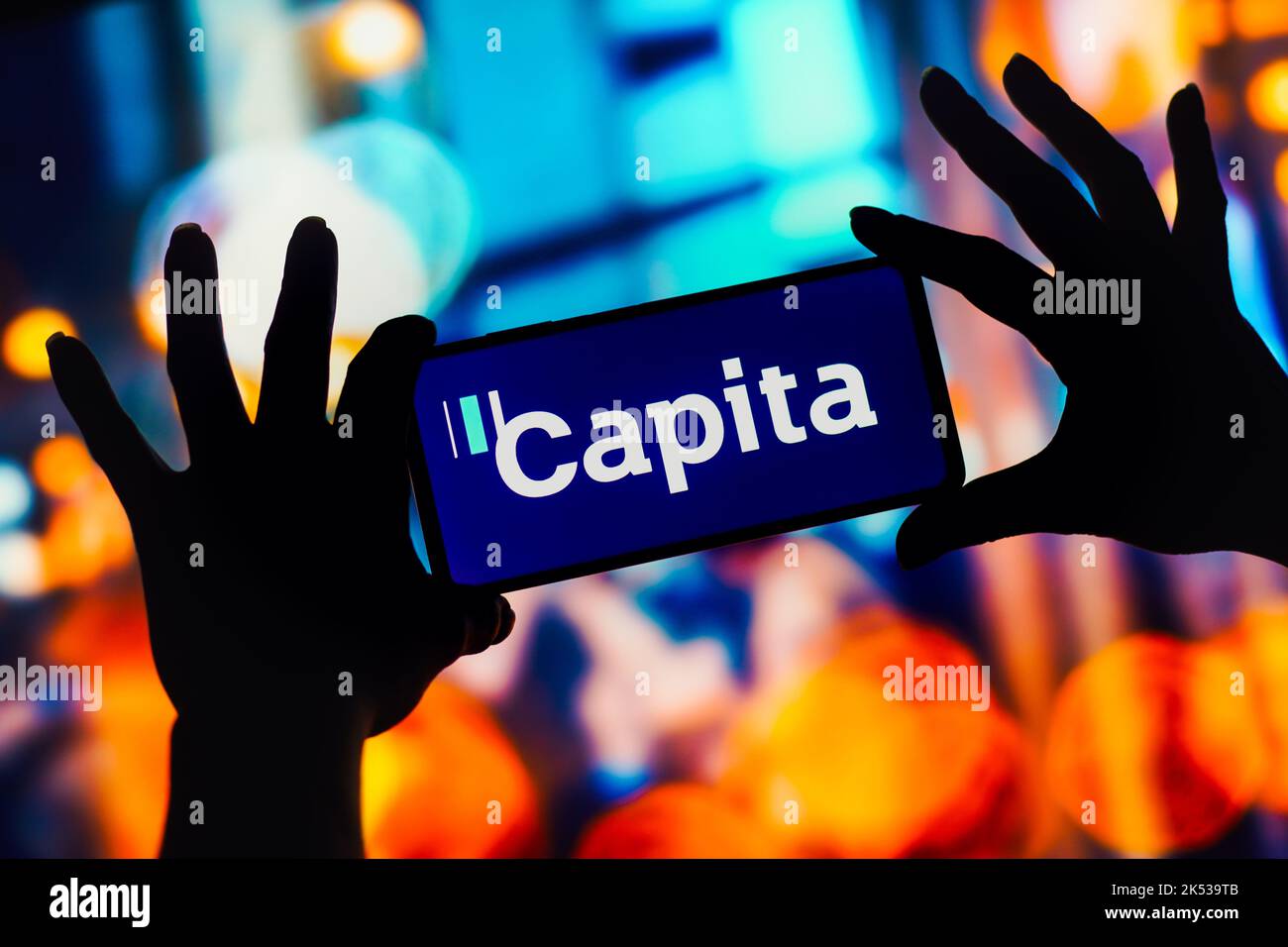 In this photo illustration, the Capita plc logo is seen displayed on a ...