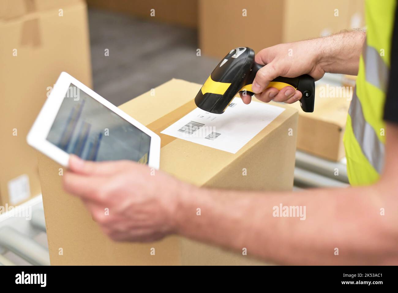 workers in the warehouse scanning parcels for retail and transport ...