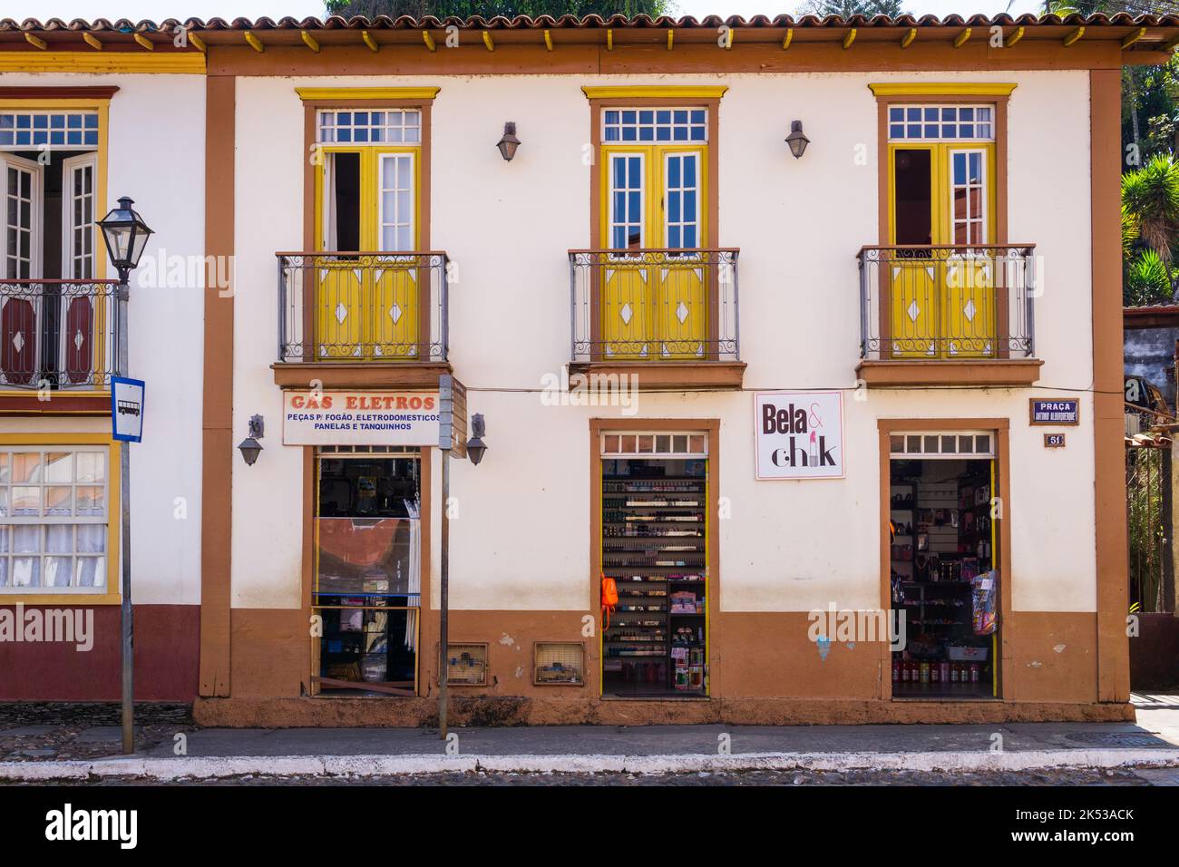 Two-story colonial building with yellow windows in Sabará, Minas Gerais ...