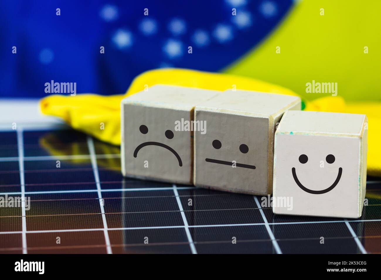 Smile Face and sad face in in wooden block cube and Brazil Flag on ...