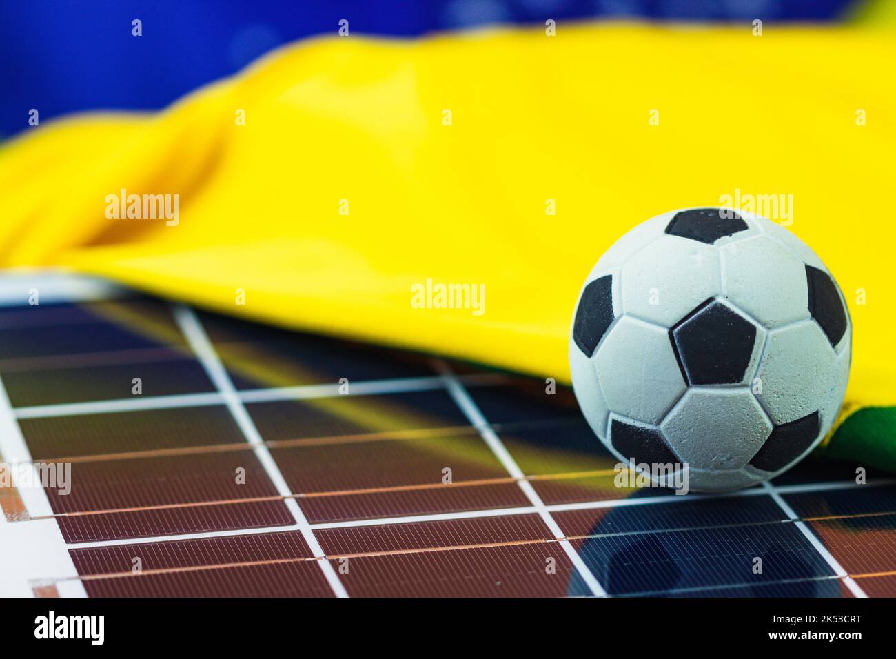 Soccer Ball and Brazil Flag over Photovoltaic Solar Panel. World Cup ...