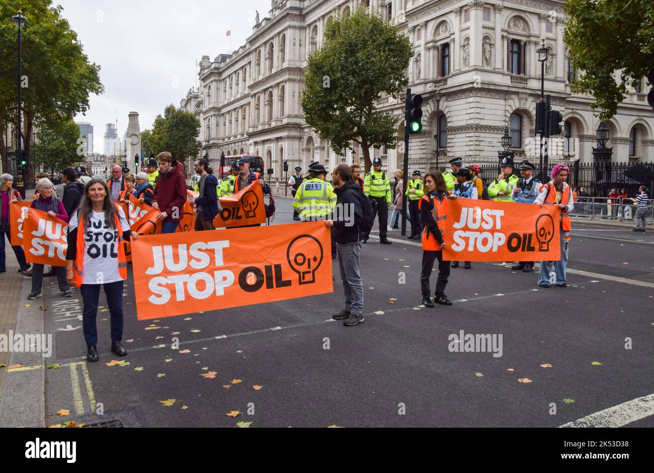 London, UK. 05th Oct, 2022. Activists hold Just Stop Oil banners ...