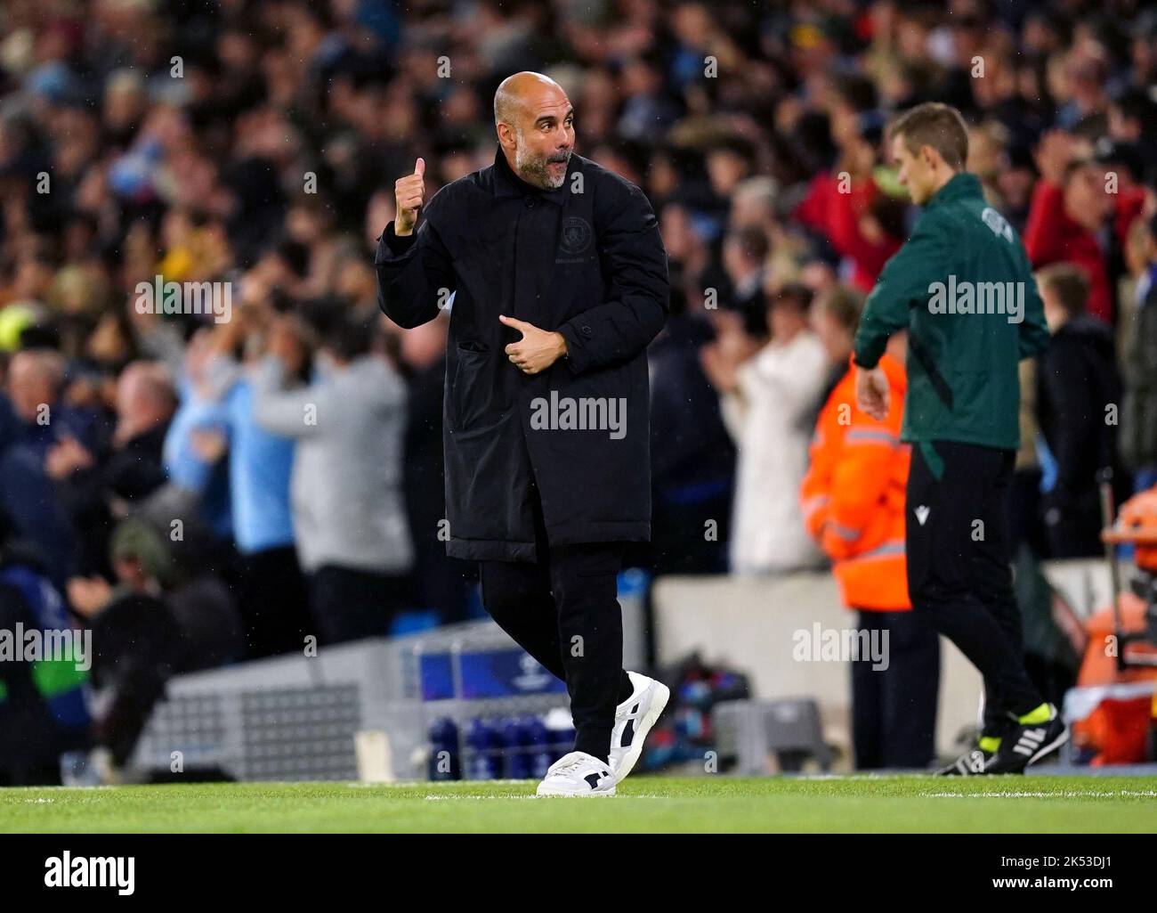 Manchester City manager Pep Guardiola celebrates after Erling Haaland ...