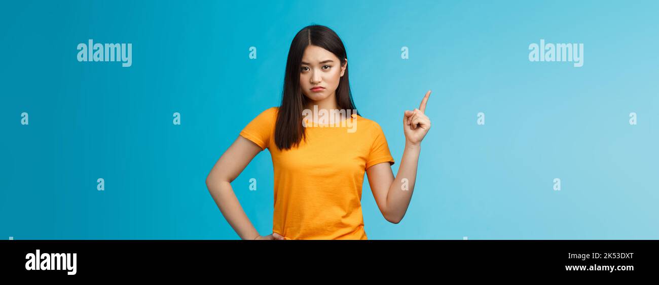 Moody upset asian girlfriend, sulking look offended and displeased ...