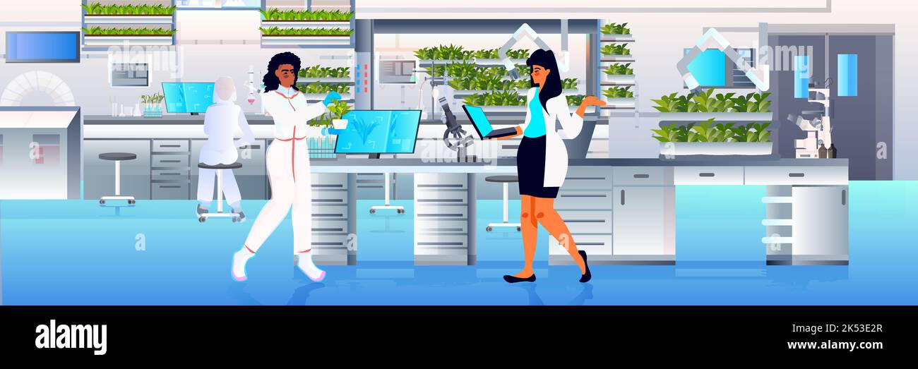 scientists team examining green plants in lab responsibility of co2 ...