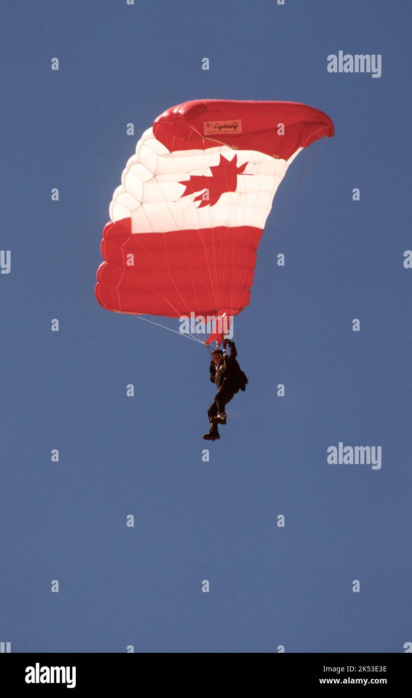 Parachutist with Canadian flag canopy Stock Photo - Alamy