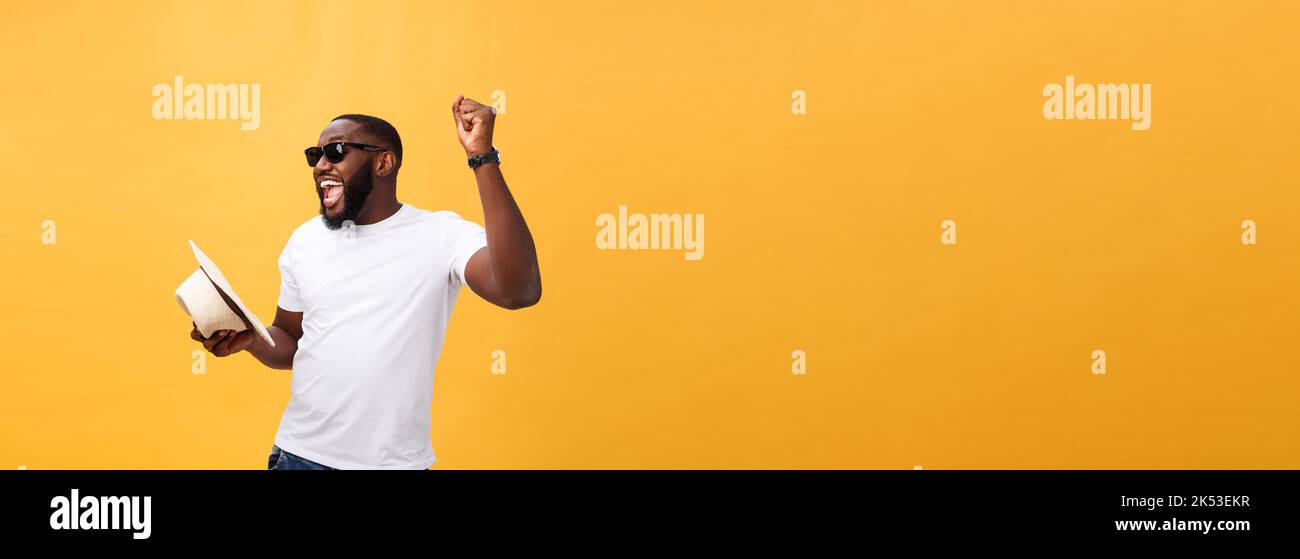 Young black man top dancing isolated on a yellow background Stock Photo ...