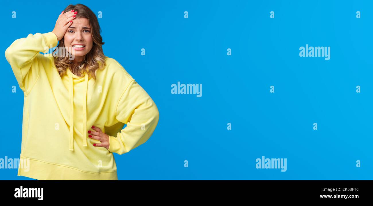 Embarrassed and worried girl bumped into car, feel anxious and ...