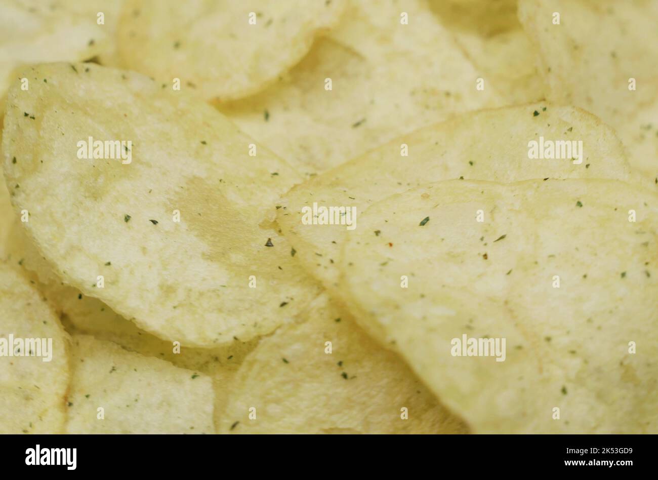 Potato chips on a rotating surface. Close-up. Food Stock Photo - Alamy