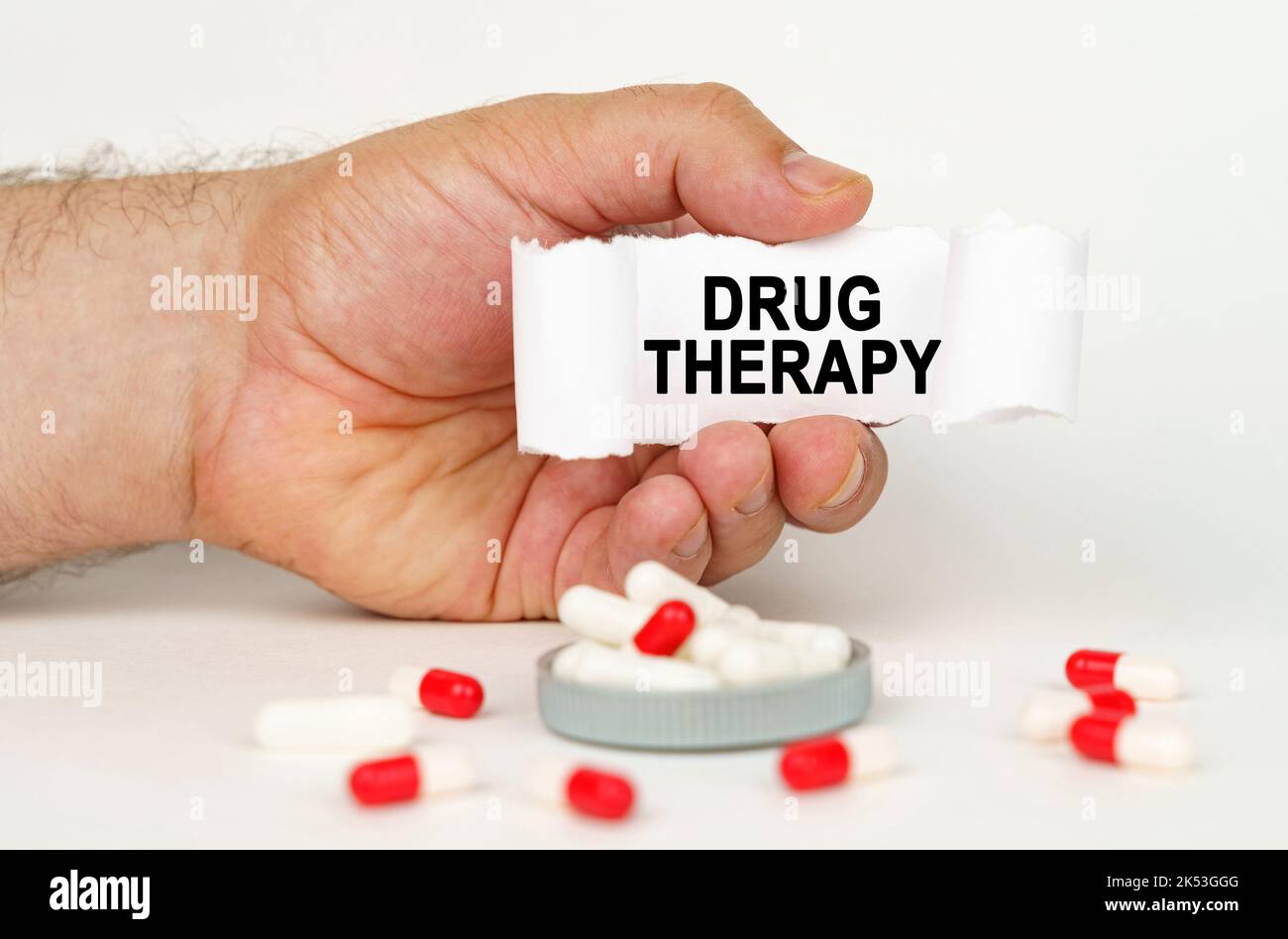 Medical concept. On a white background, medical capsules, in the hands ...