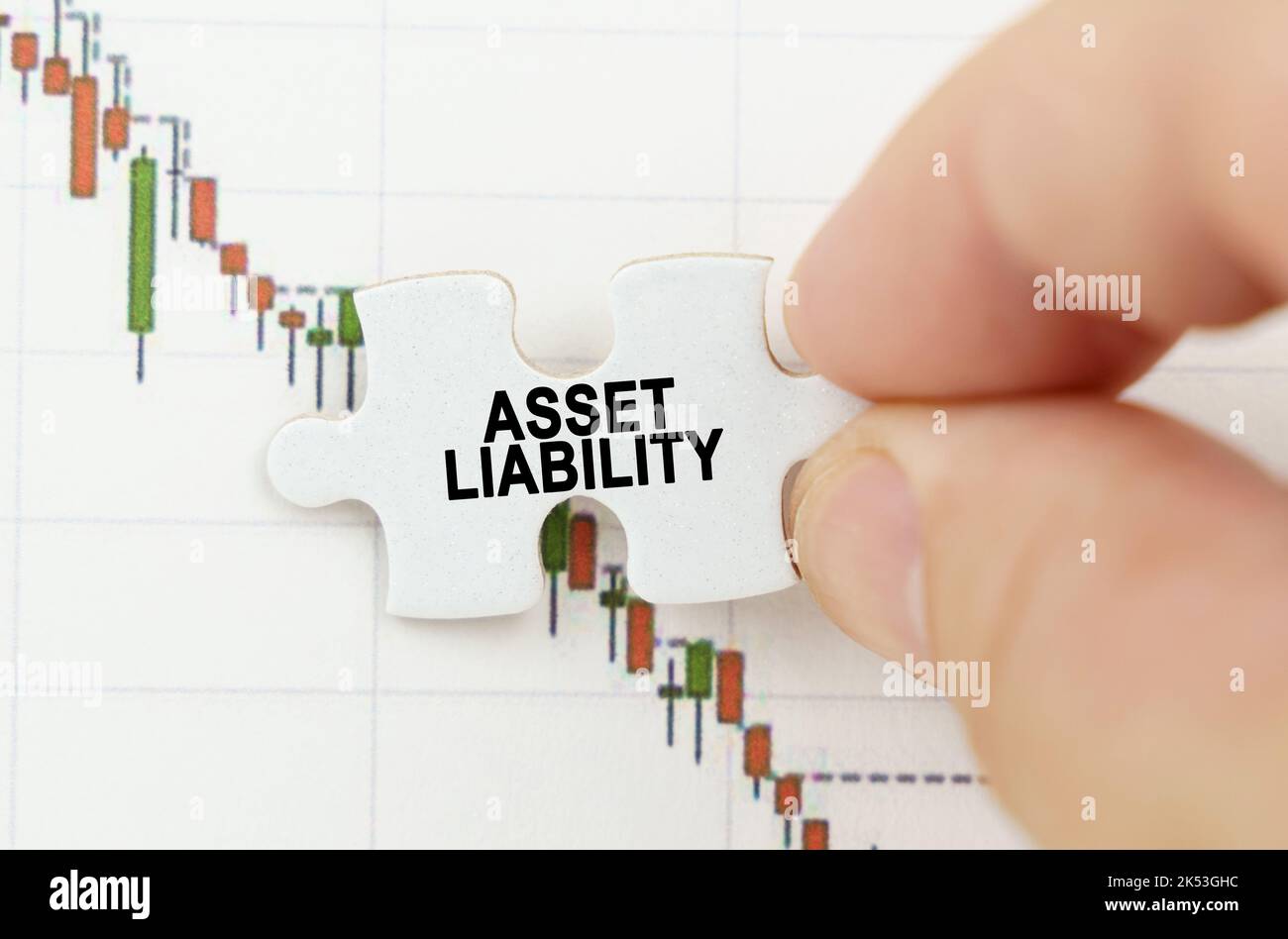 Business concept. Against the background of the quotes chart, a puzzle ...