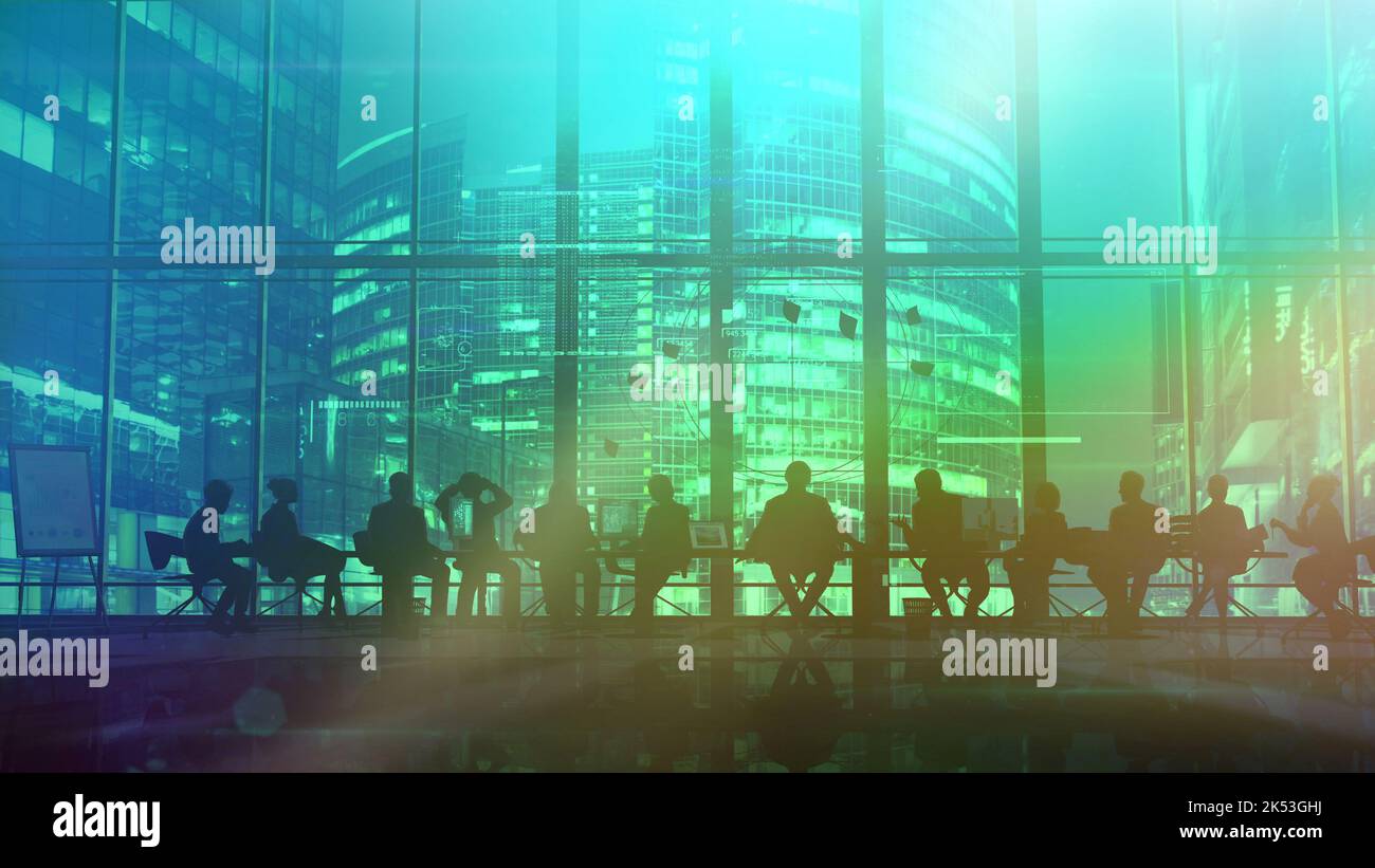 Evening meeting of a team of businessmen in the office at a big table ...