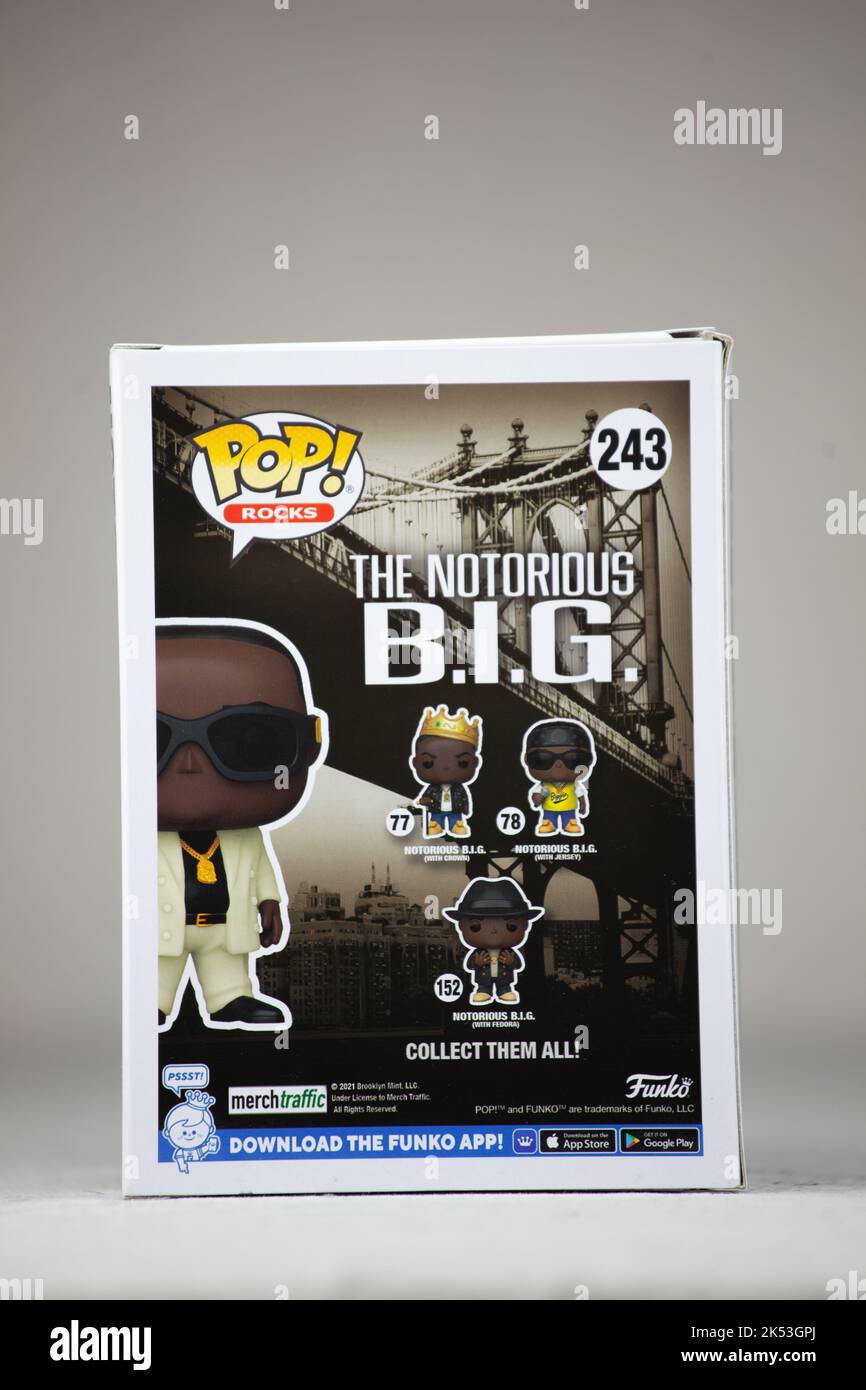 Vertical shot of the Funko Pop Notorious BIG Vinyl Figure against light ...