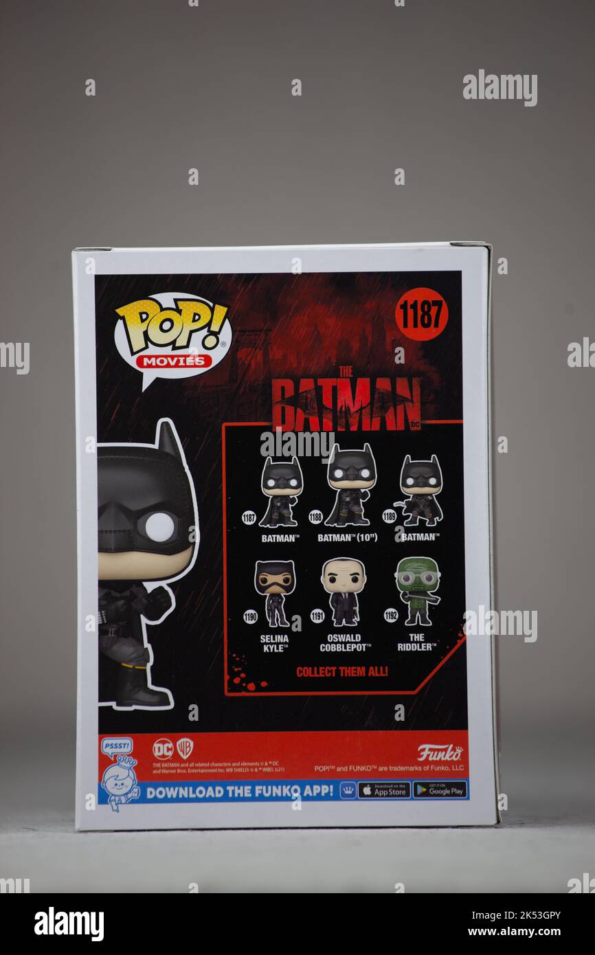 A vertical shot of the Funko Pop Batman Vinyl Figure against light ...