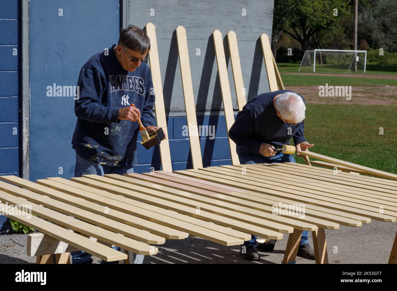 St. Johnsville, Montgomery County, New York: Volunteers paint slats of ...