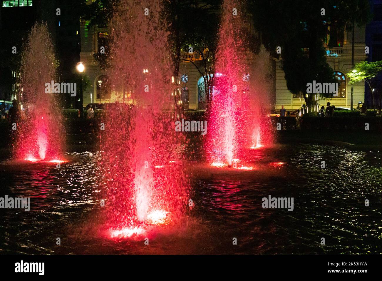 Fountain illuminated with red LED lights during Christmas at Praça da ...