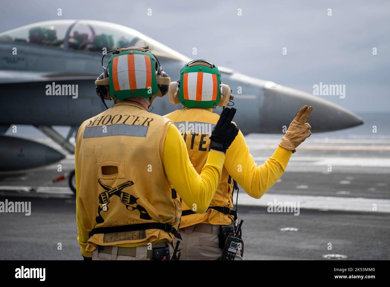 221004-N-DU622-1242 PACIFIC OCEAN (Oct. 4, 2022) Two shooters prepare ...