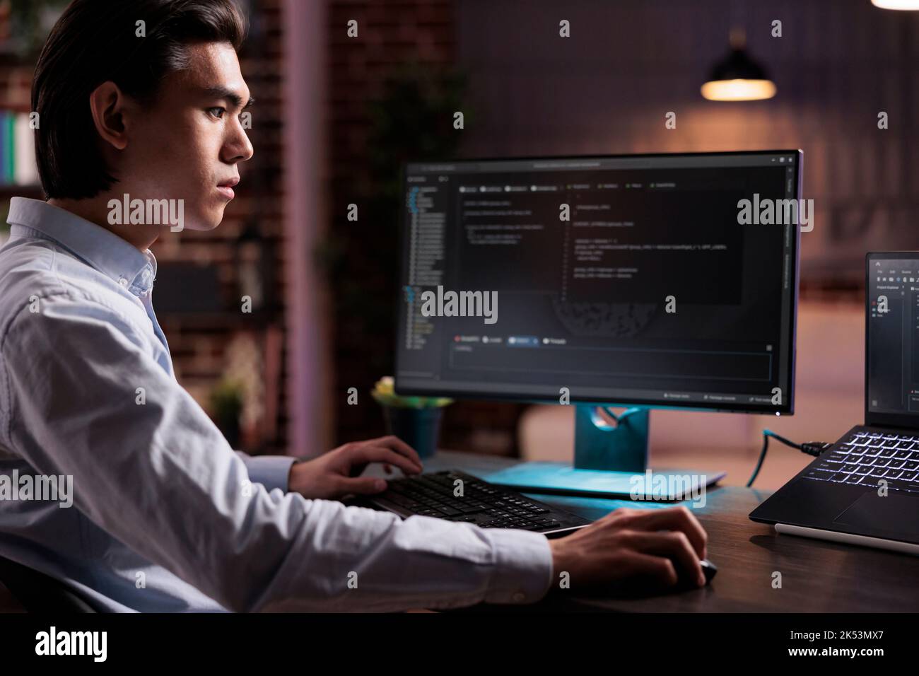Male Freelancer Developing App Software On Computer Working With Binary Code Program To Create