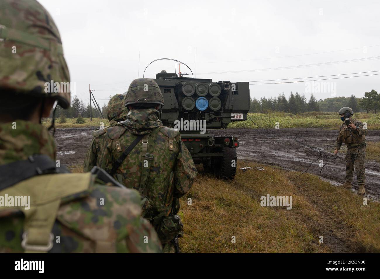 U.S. Marines with 3d Battalion, 12th Marines and members of the ...