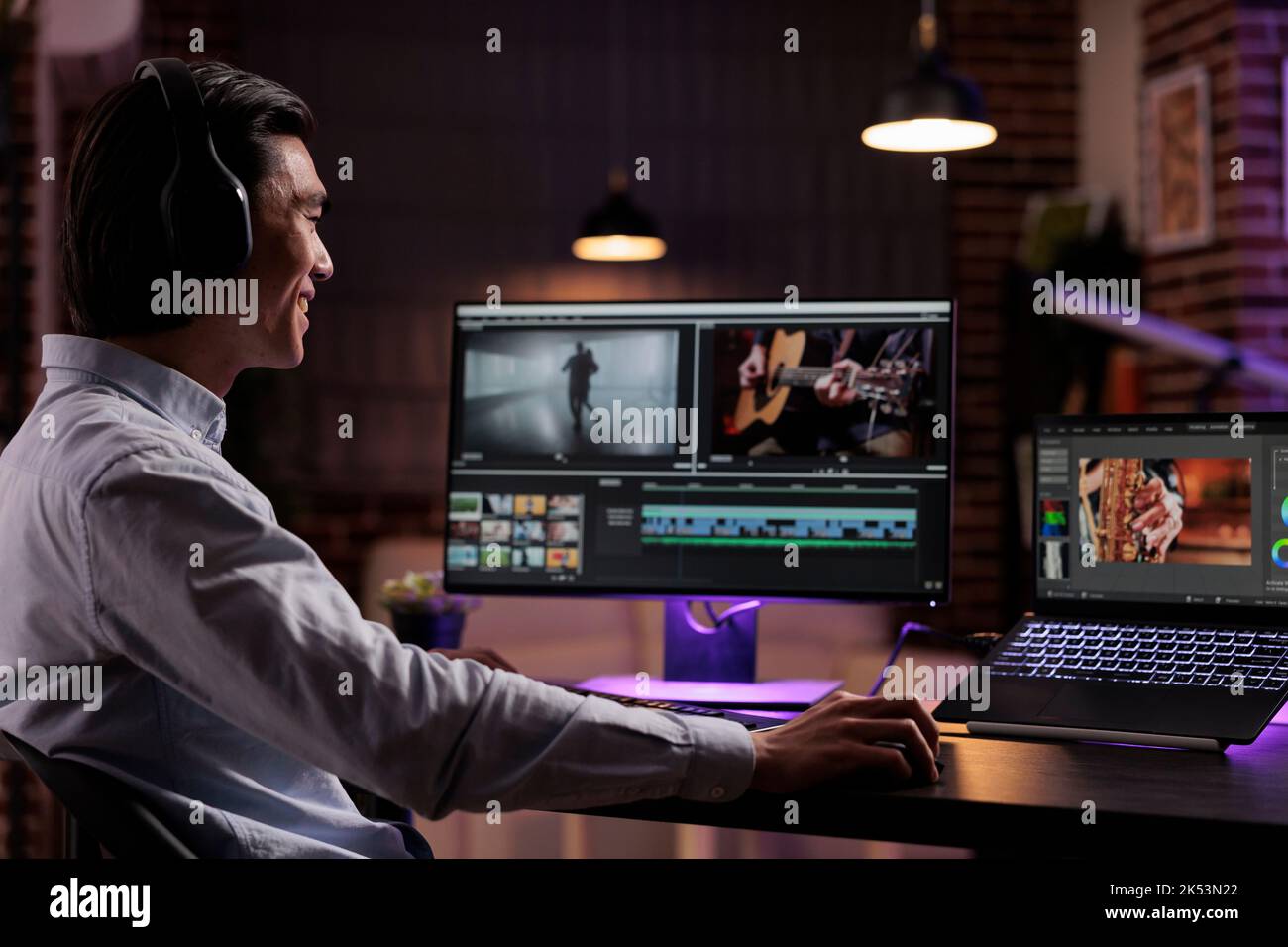 Asian creator editing movie footage with media software, working on ...