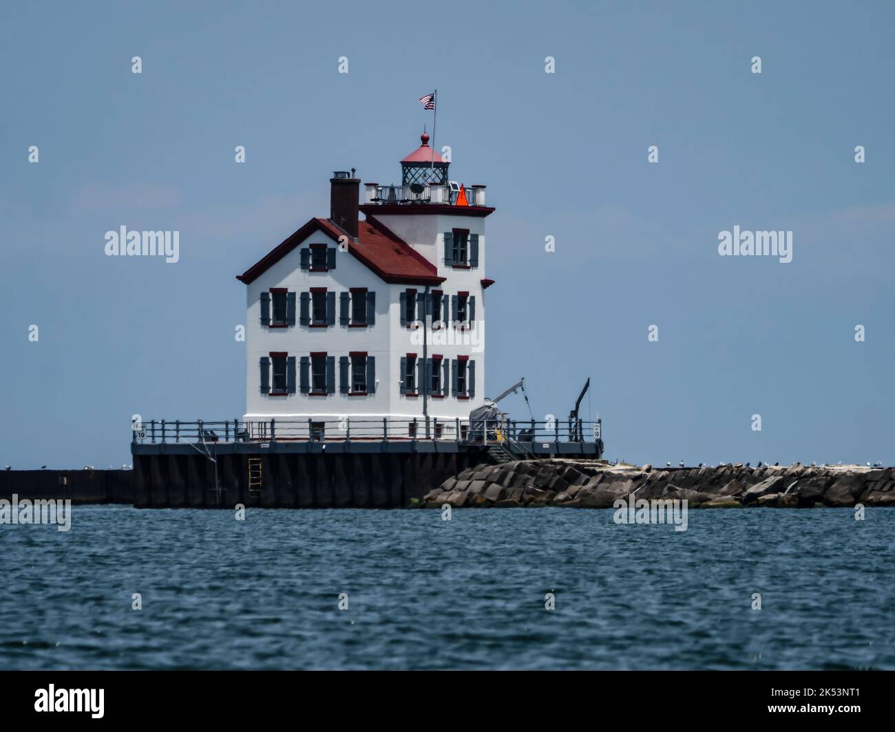 A scenic view of the Lorain Lighthouse located on lake Erie on a clear ...
