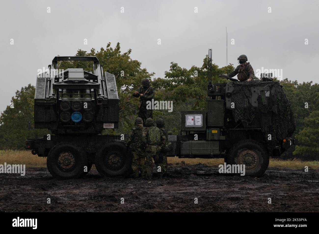 U.S. Marines with 3d Battalion, 12th Marines and members of the ...