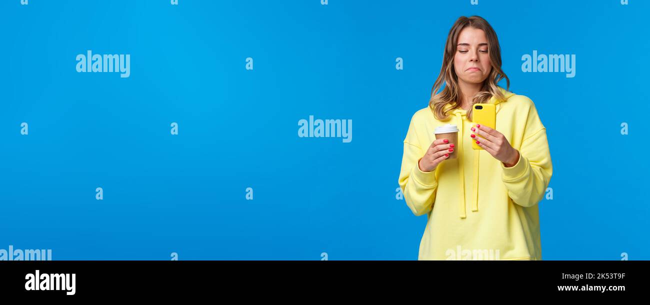 Girl checking out her photo on smartphone screen with not bad ...