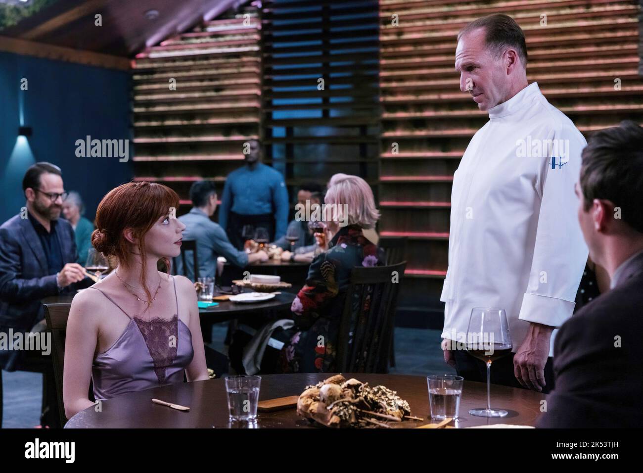 THE MENU, front, from left: Anya Taylor-Joy, Ralph Fiennes, Nicholas ...