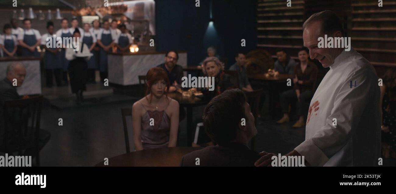 THE MENU, foreground from left: Anya Taylor-Joy, Nicholas Hoult, Ralph ...