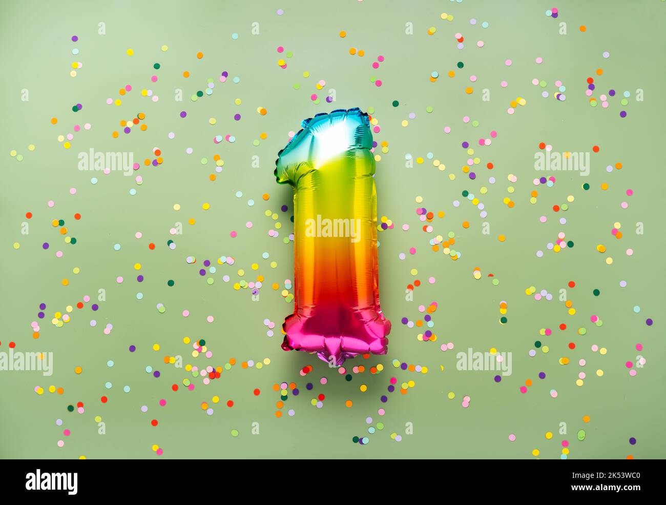 Colorful balloon number 1 on light green background. New Year of ...